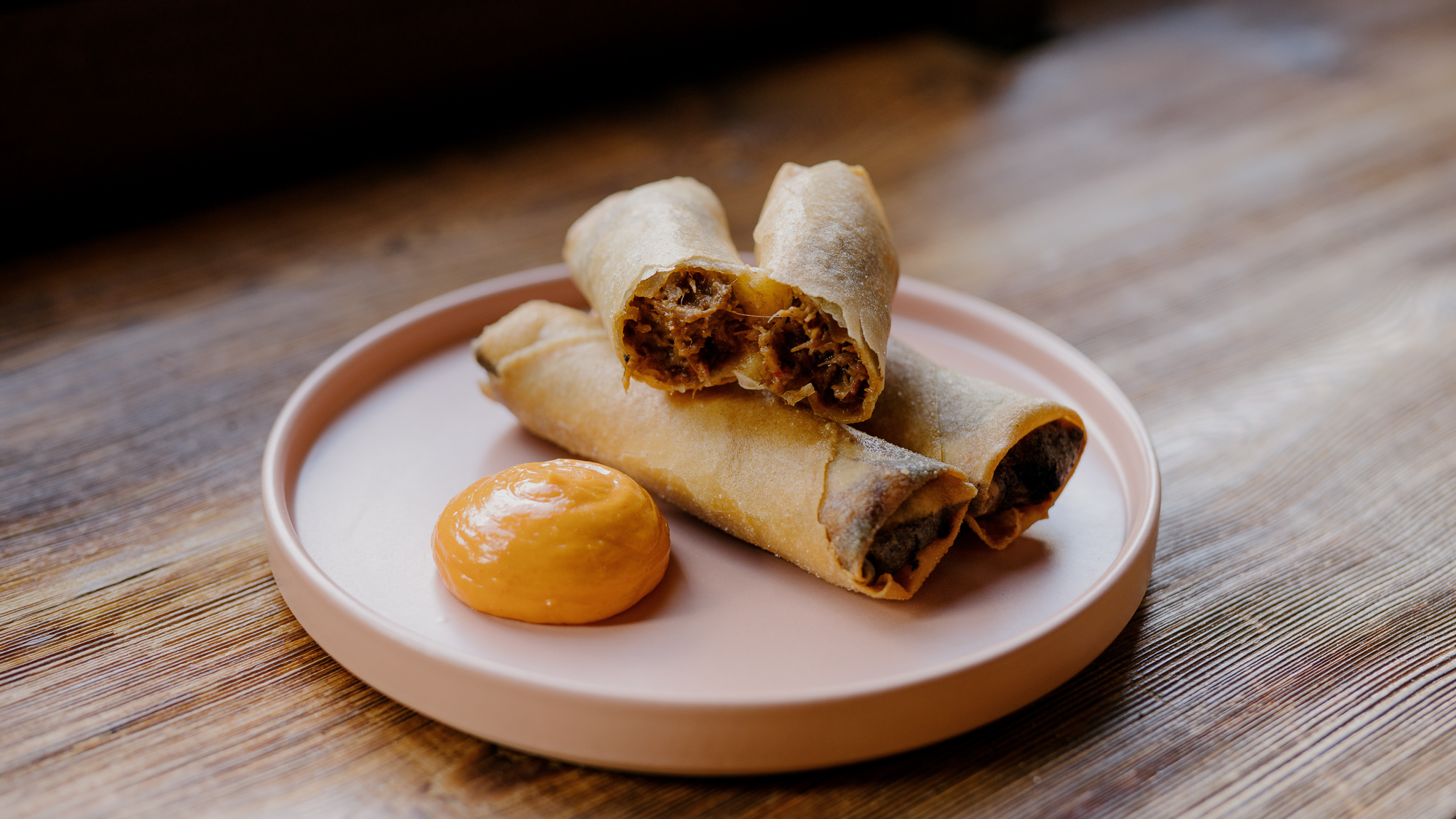 Signature Dish: Mister S’s Burnt End Rendang Spring Rolls - District ...